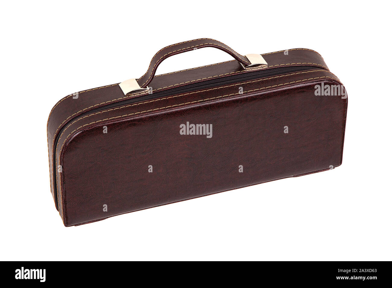A small brown leather bag with a handle isolate on a white background ...
