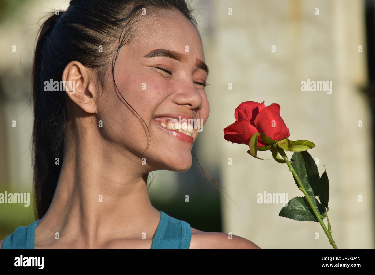 Female And Happiness With Roses Stock Photo - Alamy