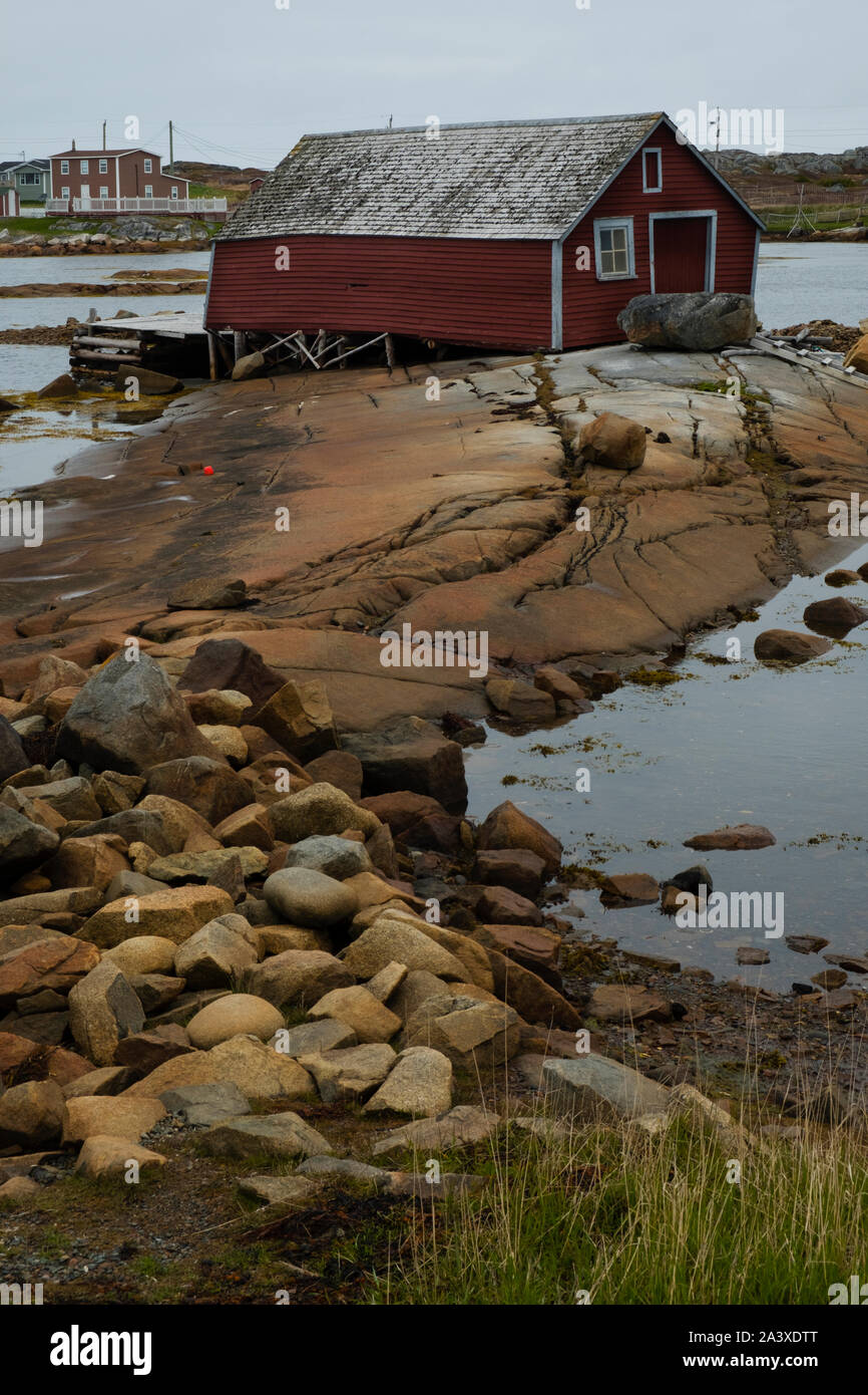 Slanted old red stage shed in Tilting, Fogo Island, Newfoundland Stock ...