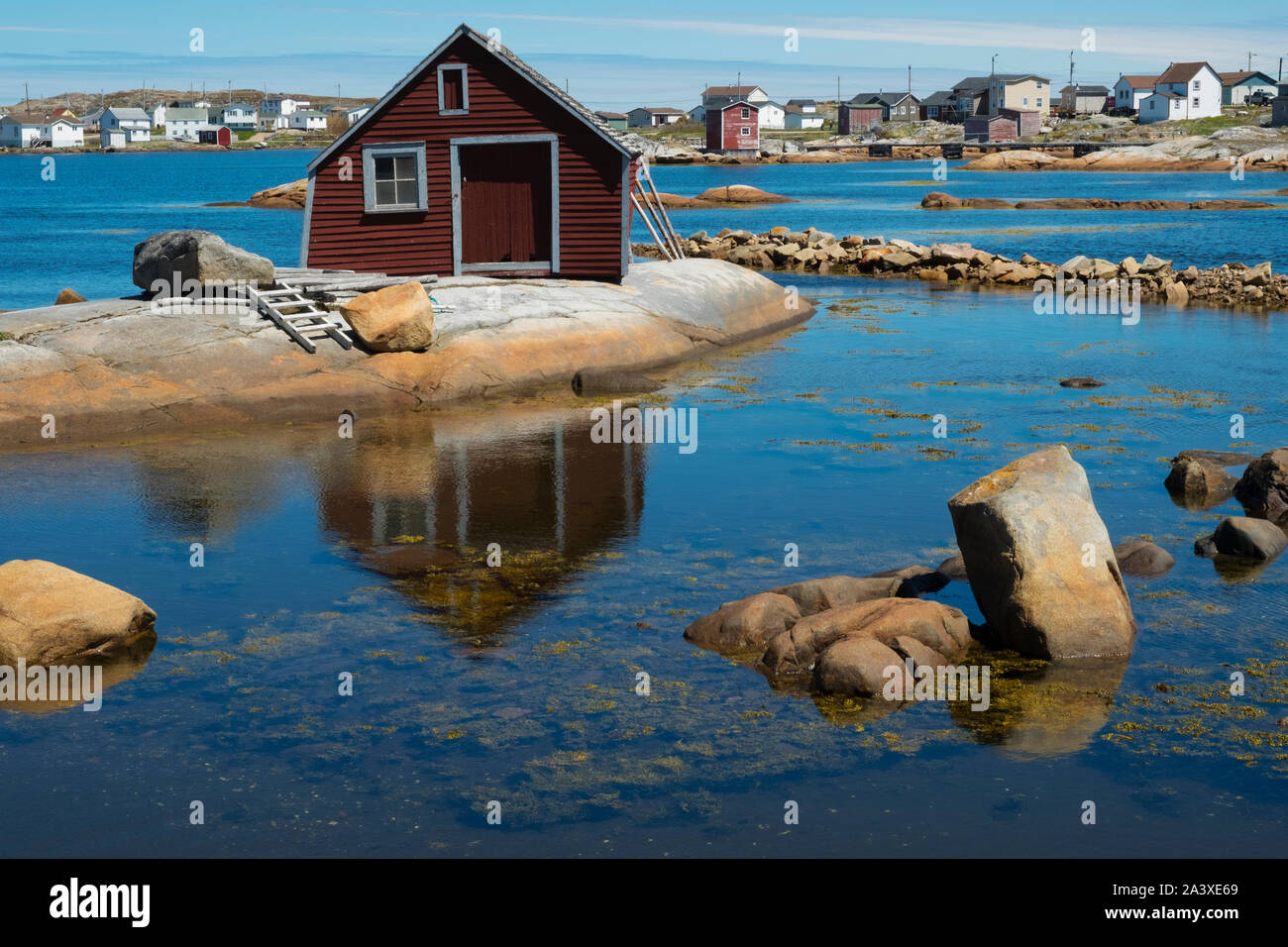 Slanted old red stage shed in Tilting, Fogo Island, Newfoundland Stock ...
