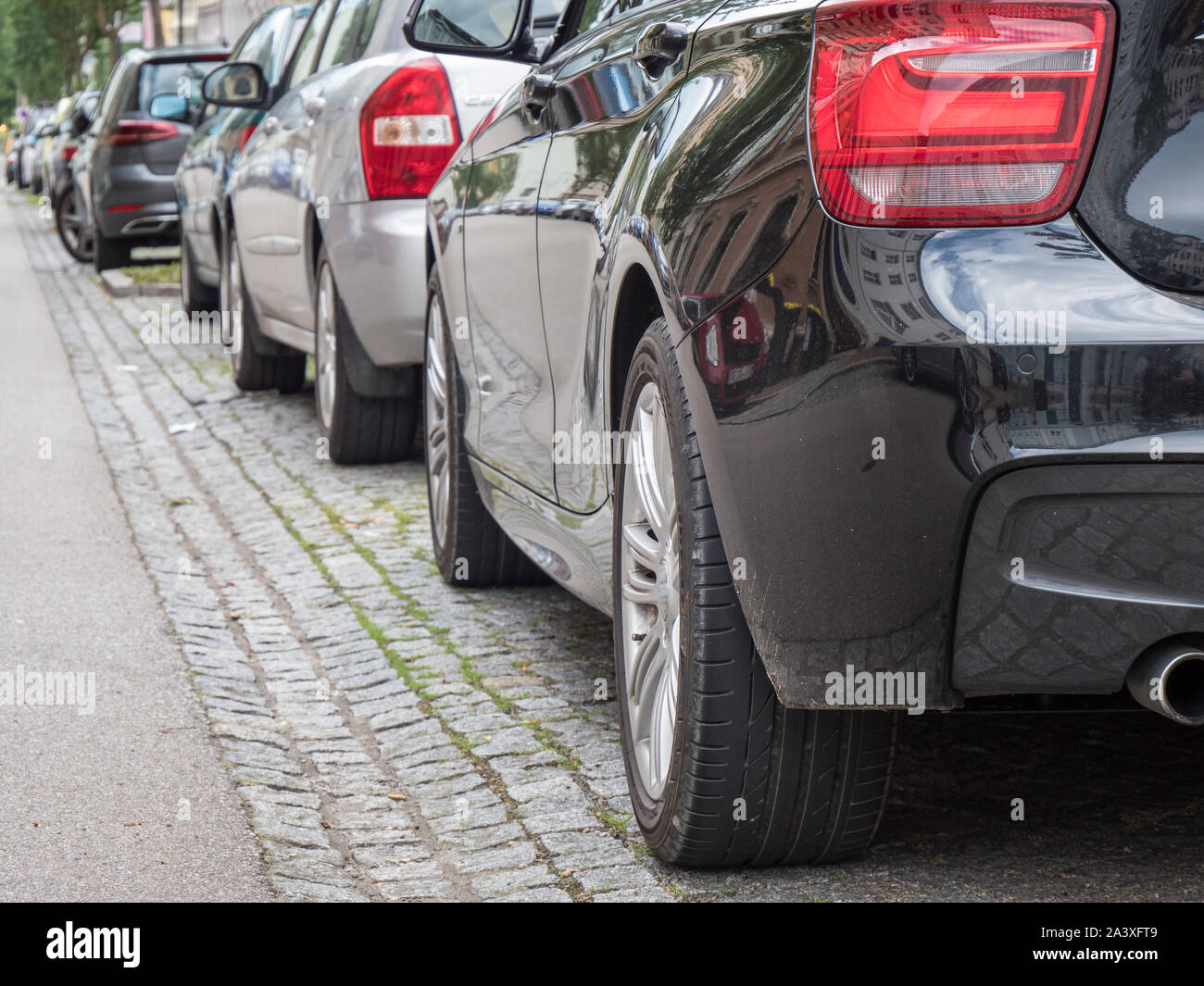 parked cars on a street Stock Photo - Alamy
