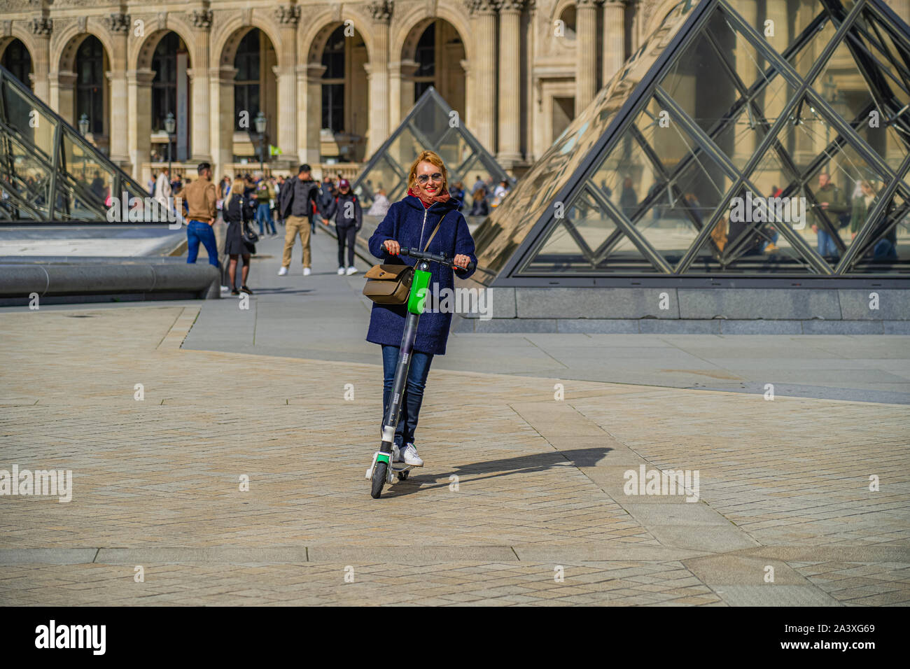 A bright crisp spring morning zapping by electric scooter through Paris ...