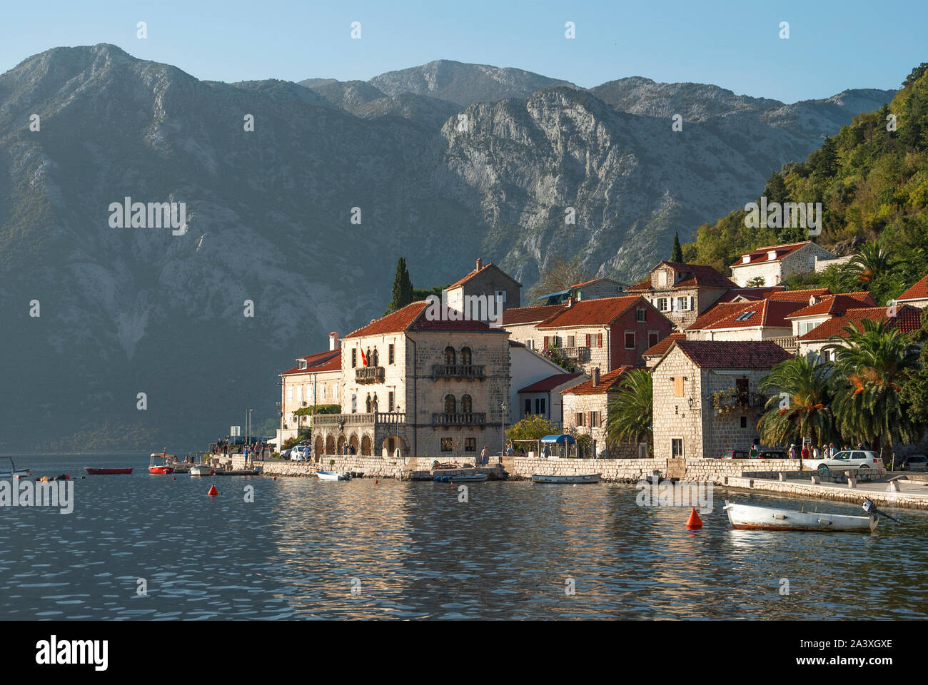 Perast village with mountain backdrop hi-res stock photography and ...