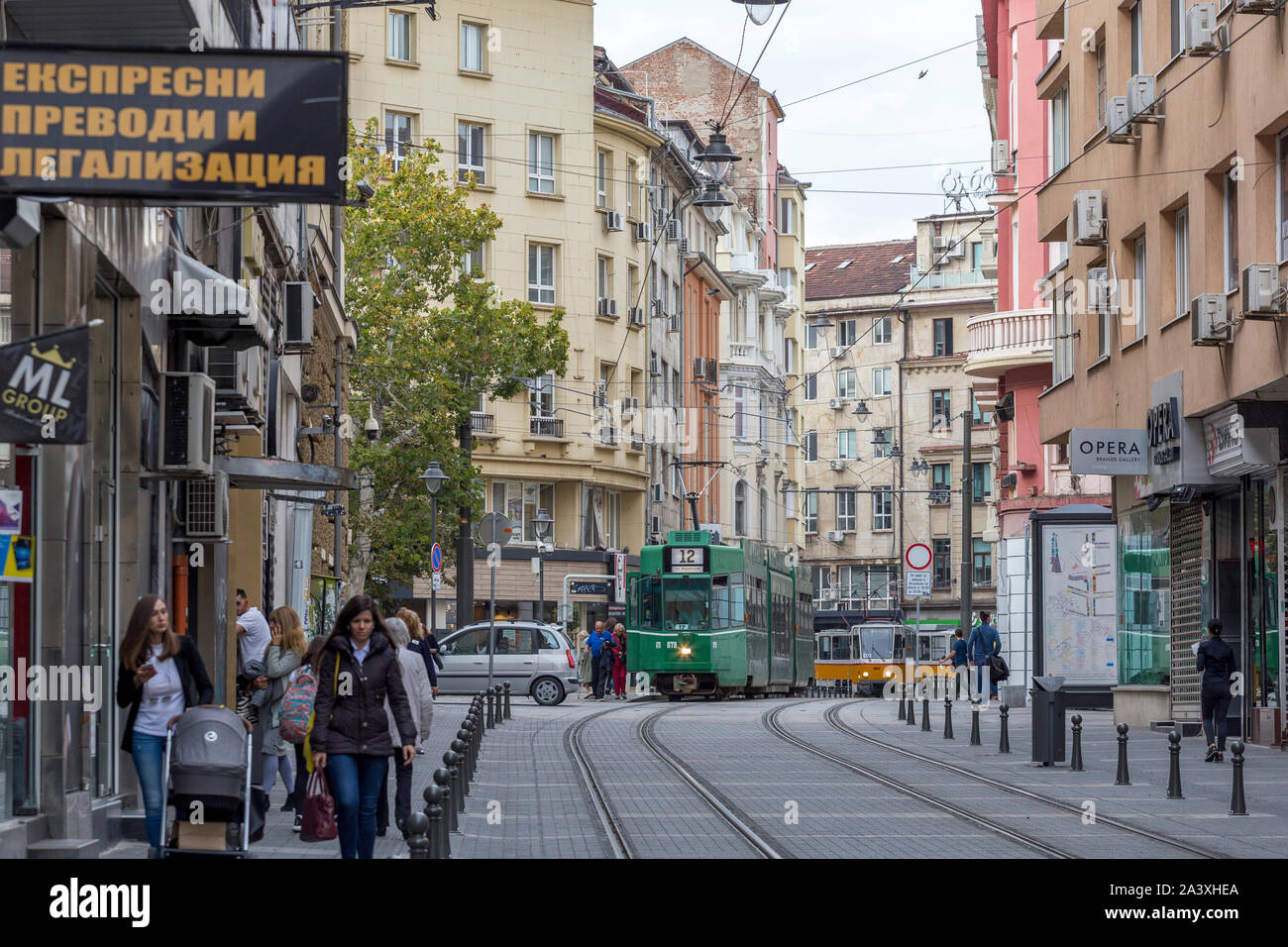 SOFIA, BULGARIA - OCT 10: Pedestrians and trams are passing through the ...