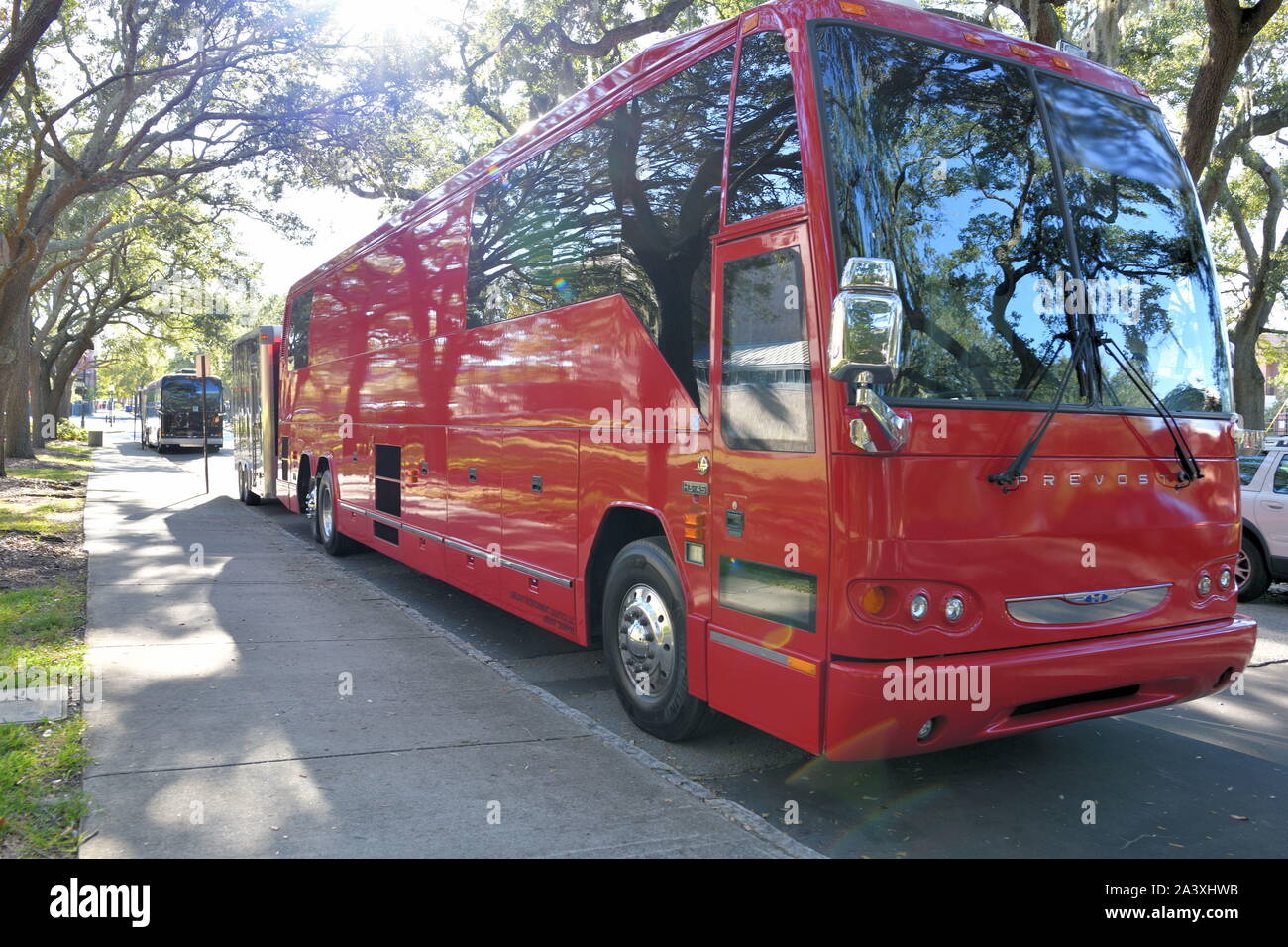 Big Red Tourist Bus Parked by Museum While Riders Tour the Museum and ...
