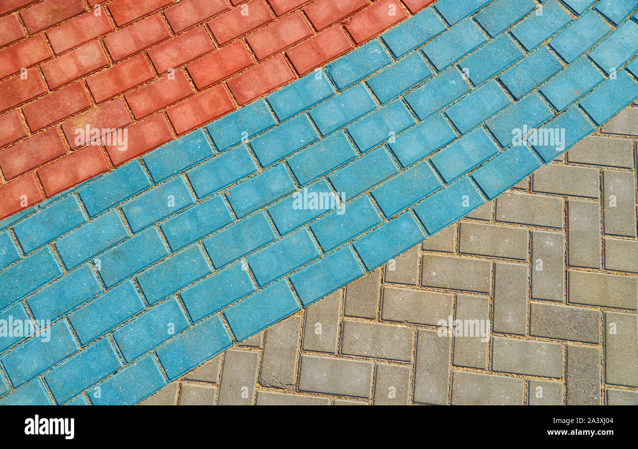 red and blue paving tiles for background or texture Stock Photo - Alamy