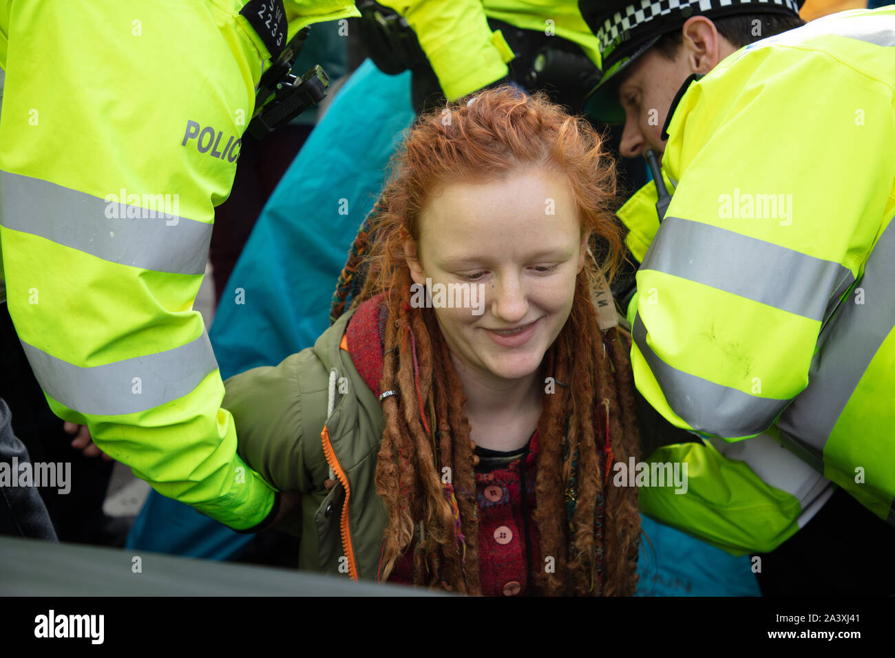 Female activist arrested hi-res stock photography and images - Alamy