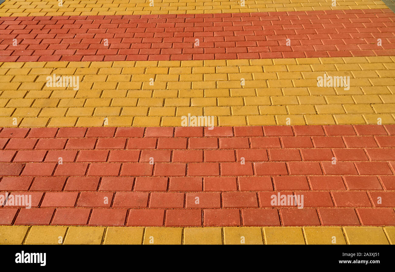 yellow and red brown paving tile for background or texture Stock Photo ...