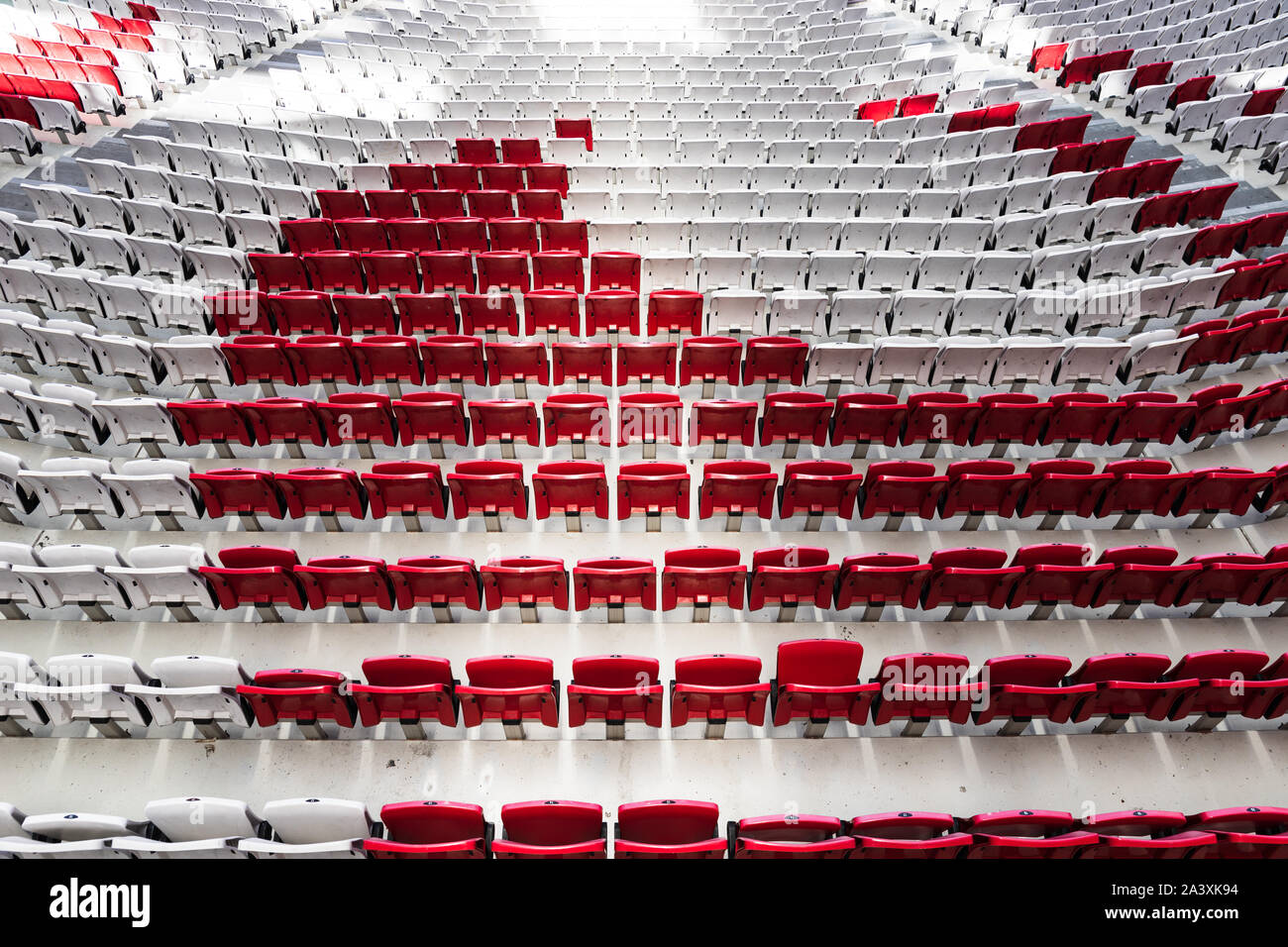 Aerial view of red and white empty stadium chairs Stock Photo - Alamy