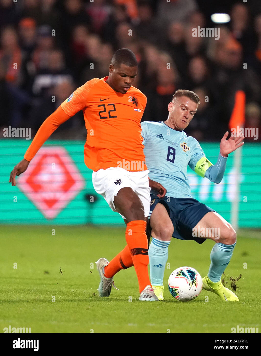 Northern Ireland's Steven Davis (right) and Netherlands' Denzel ...