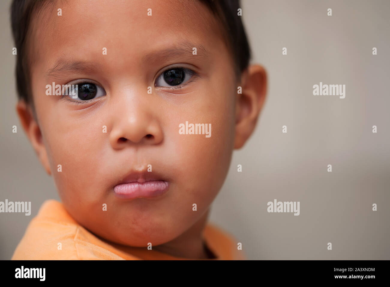 Boy with a sad facial expression hi-res stock photography and images - Alamy