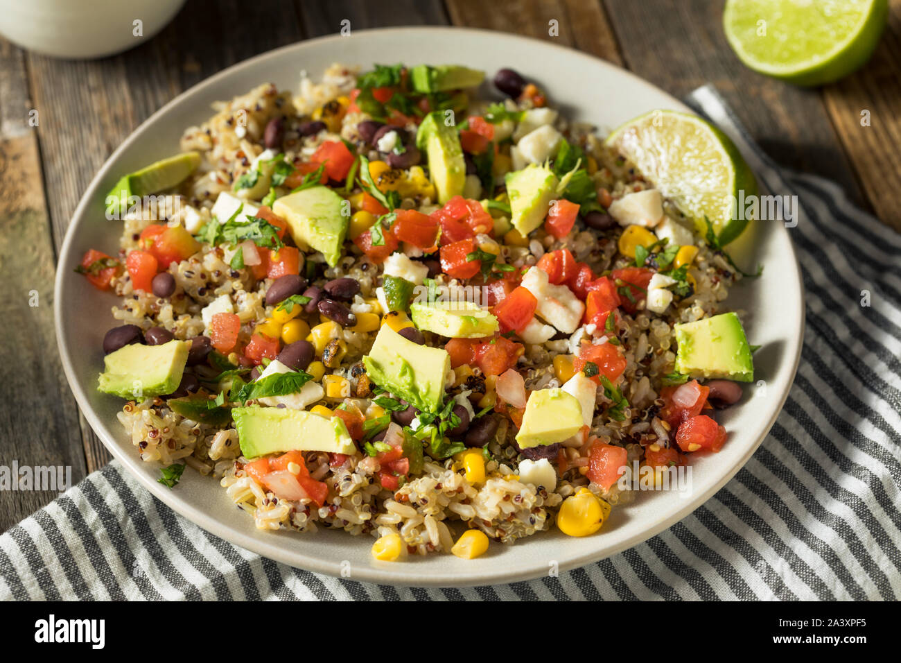 Homemade Mexican Baja Rice Bowl with Avocado and Salsa Stock Photo - Alamy