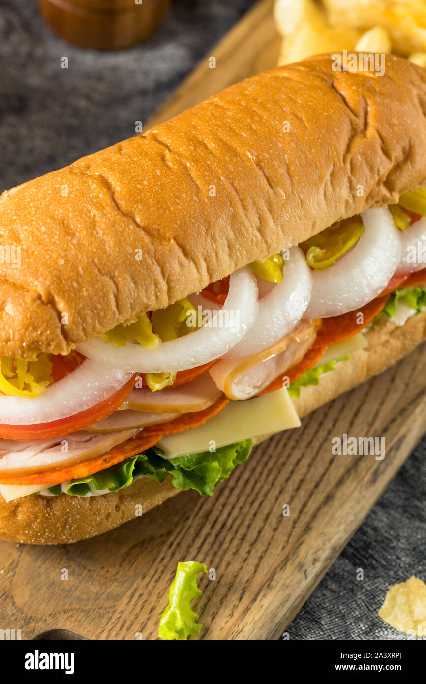 Homemade Turkey Sub Sandwich with Salami Lettuce and Tomato Stock Photo ...