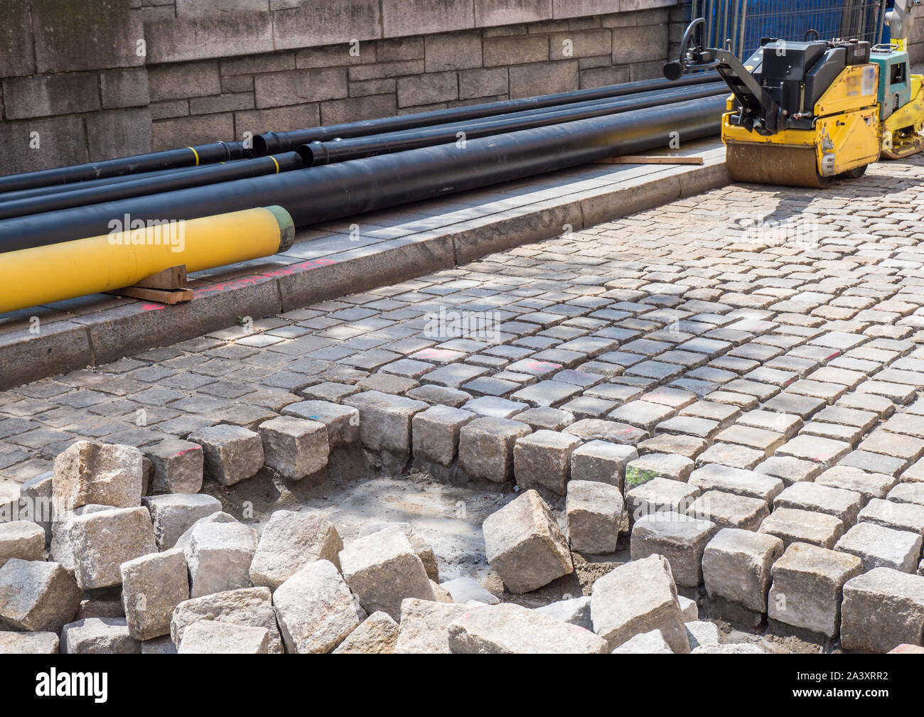 Road construction cobblestone Stock Photo - Alamy