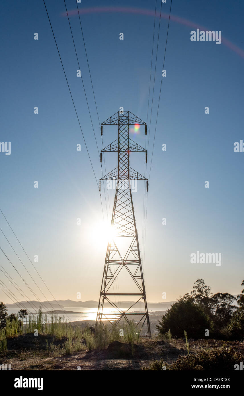 Tall PG&E transformer tower with power lines and view of San Francisco ...