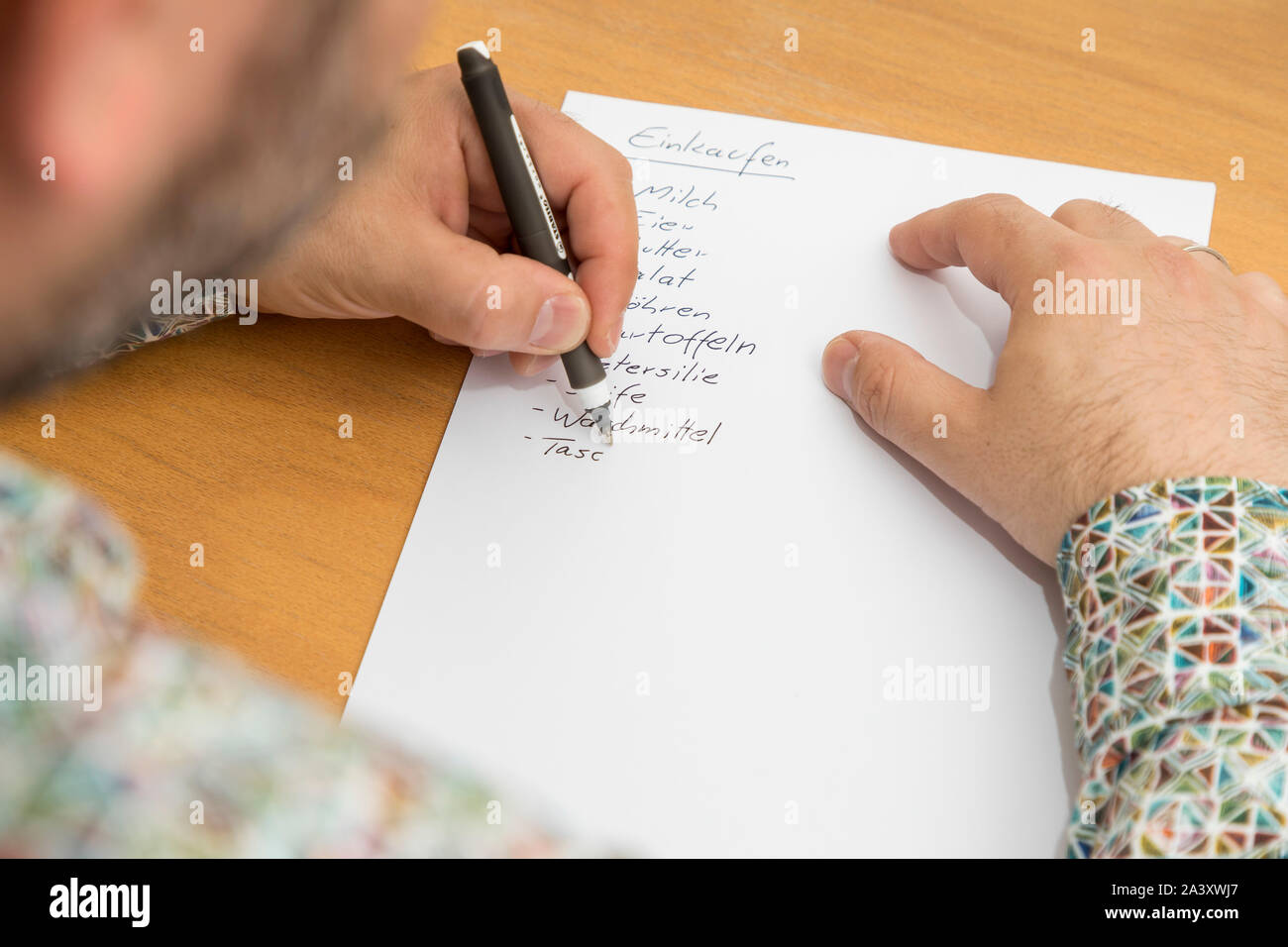 Left handed writing hi-res stock photography and images - Alamy