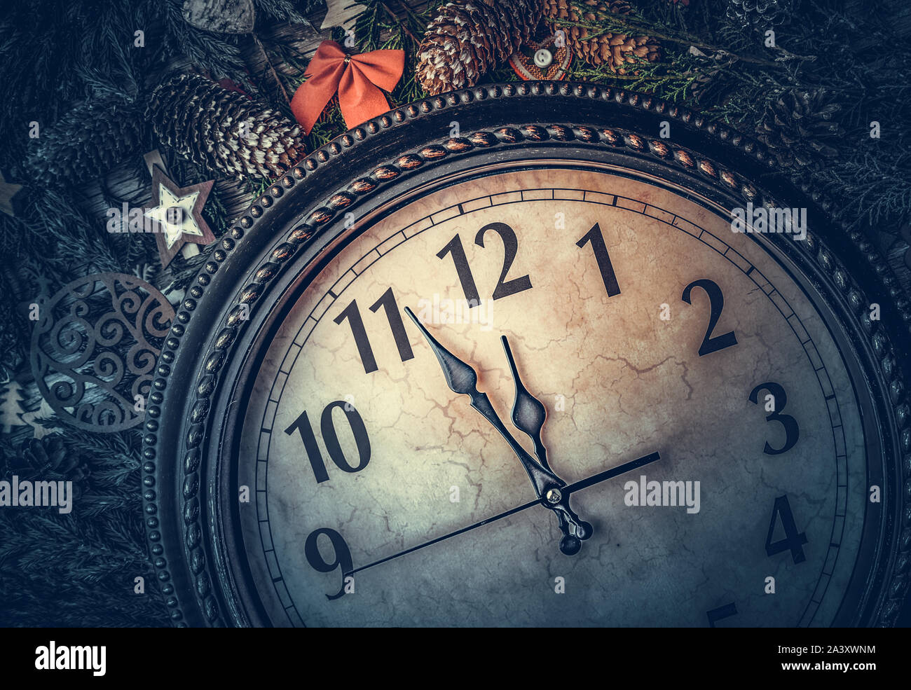 New Year's still life. Old clock shows midnight Stock Photo - Alamy