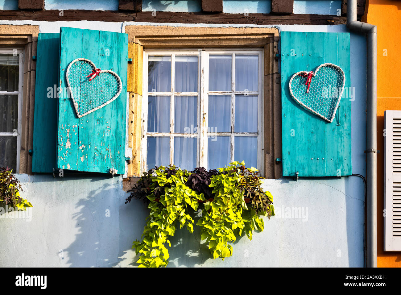 Open old wooden shutter on a window in Colmar France Stock Photo - Alamy