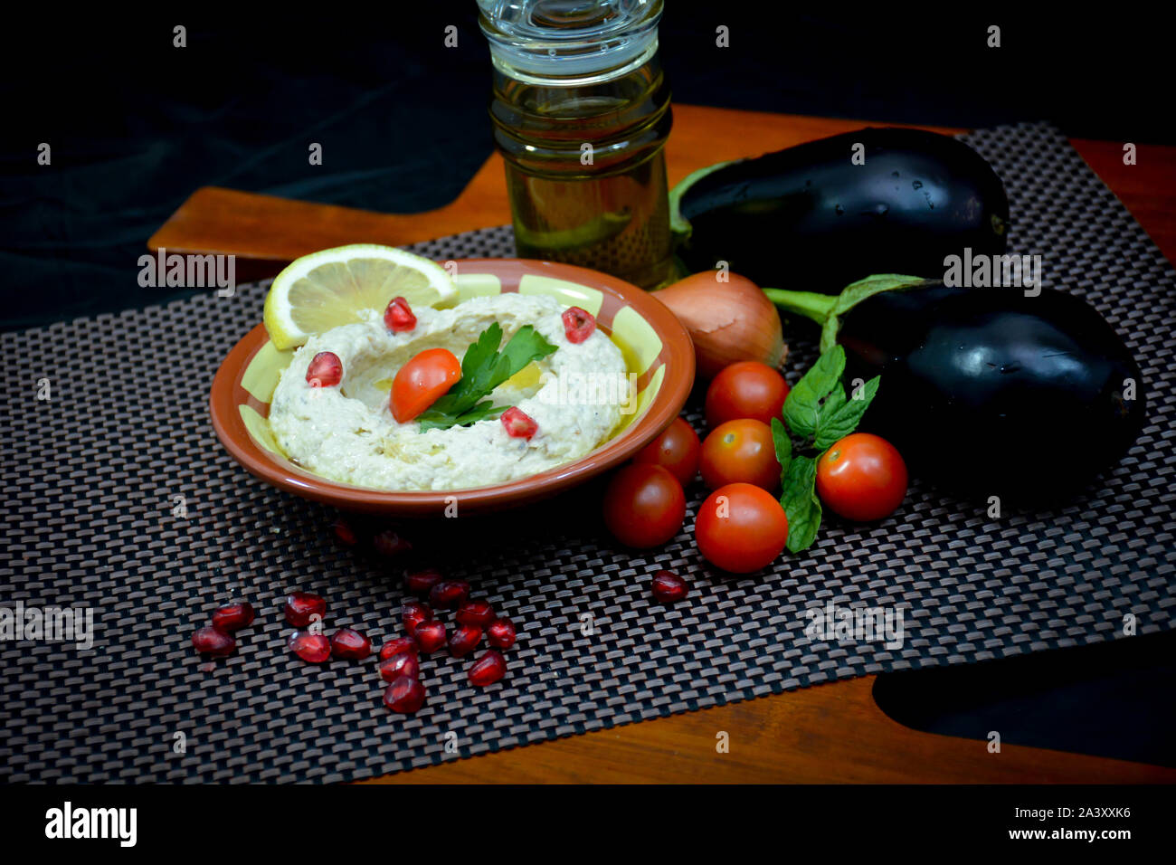 Plate of traditional eastern MUTABBAL. Arabic traditional food . Middle ...