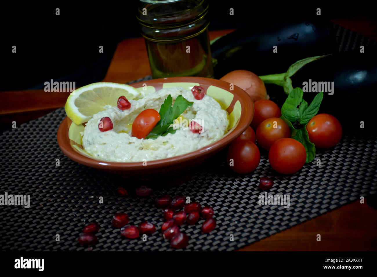 Plate of traditional eastern MUTABBAL. Arabic traditional food . Middle ...