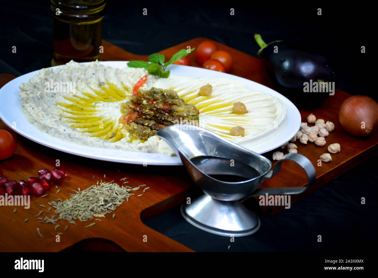 Plate of traditional eastern MUTABBAL. Arabic traditional food . Middle ...