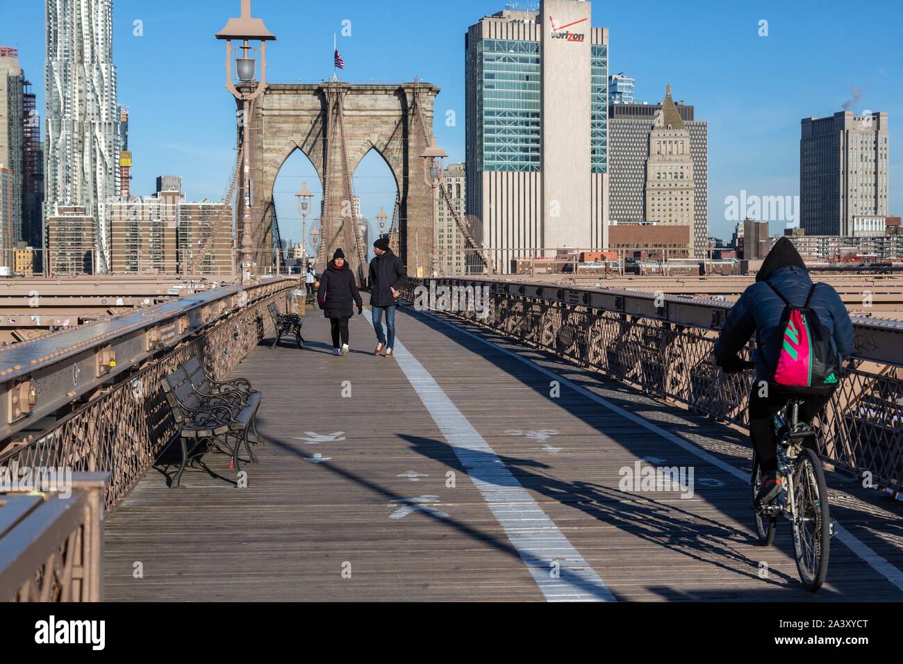 PEDESTRIAN AND BICYCLE CROSSING ON THE BROOKLYN BRIDGE, MANHATTAN, NEW ...