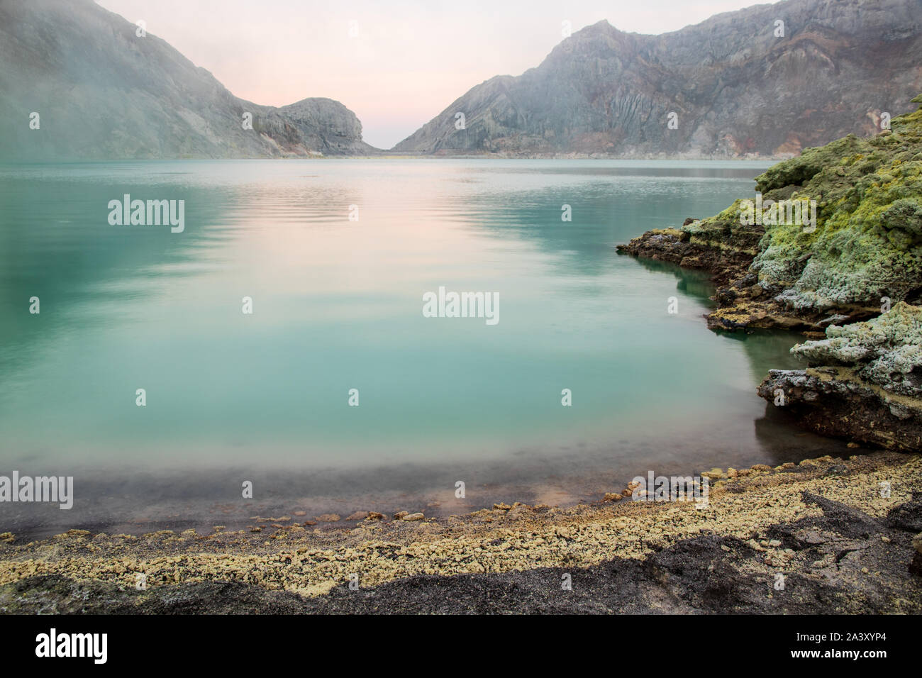 Acid lake inside the crate of Mount Ijen, a volcano in East Java ...