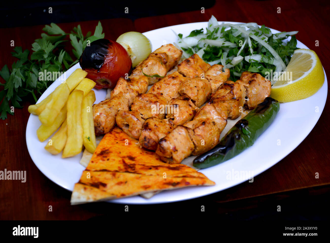Plate of Traditional arab eastern meal - selections of kebabs Stock ...