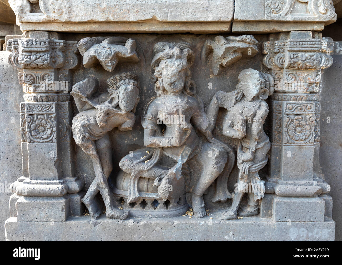 Carved idols with broken faces on the wall of Harshat Mata temple ...