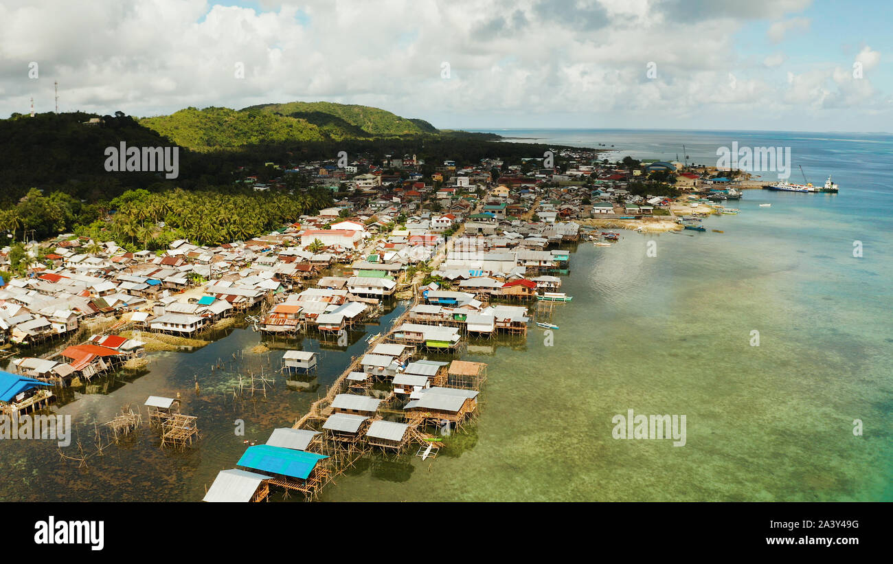 Fishing Village of stilt houses built over the sea, top view. Dapa ...