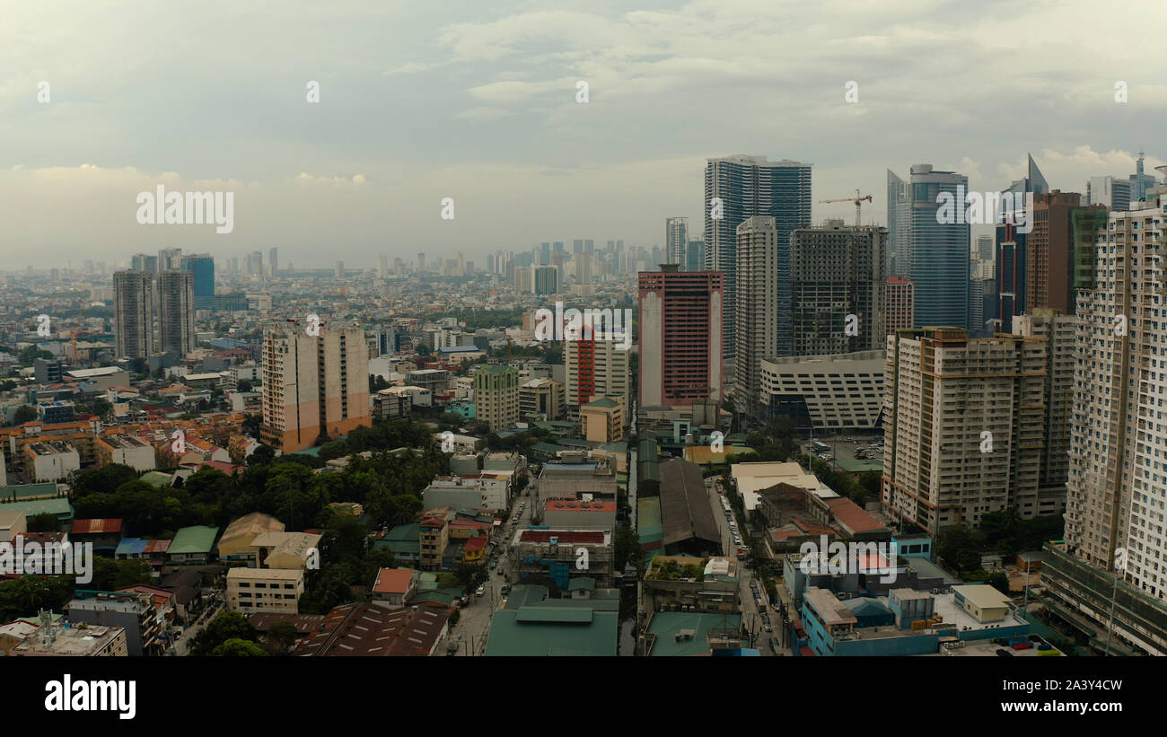 Skyscrapers and business centers in a big city Manila top view. Modern ...