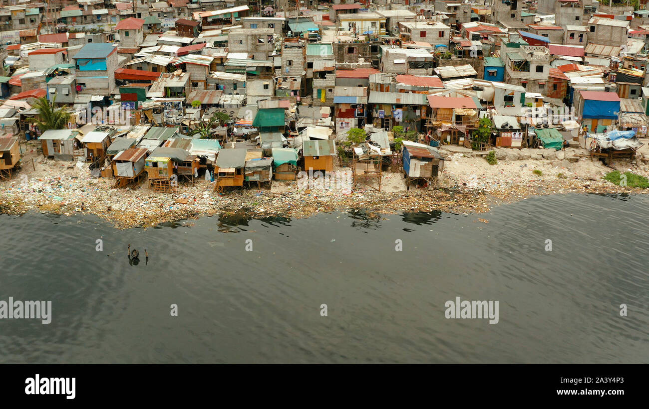 Poor district and slums in Manila with shacks and buildings. Manila ...