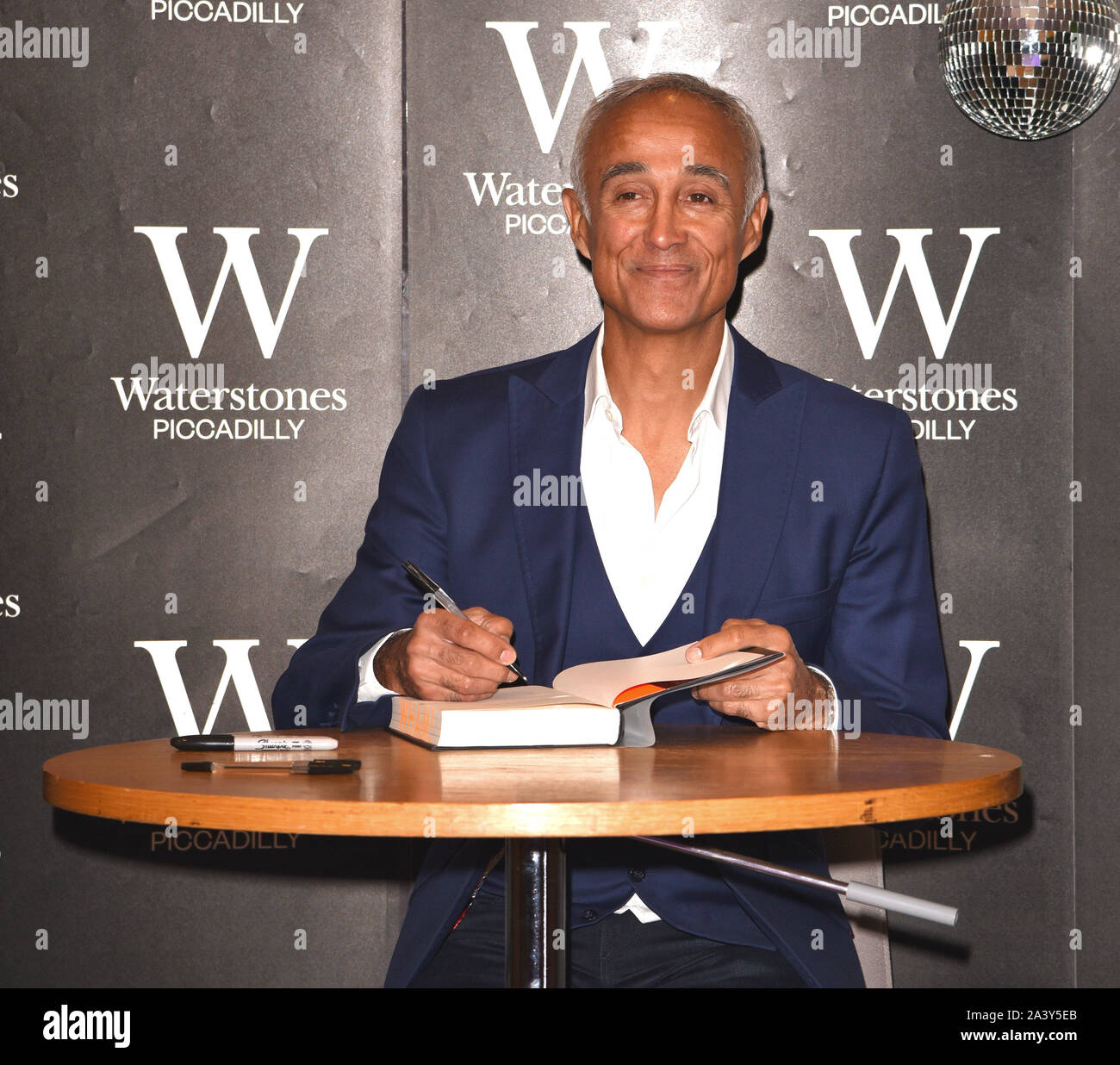 London, UK. Andrew Ridgeley signs copies of his new book 'Wham! George ...