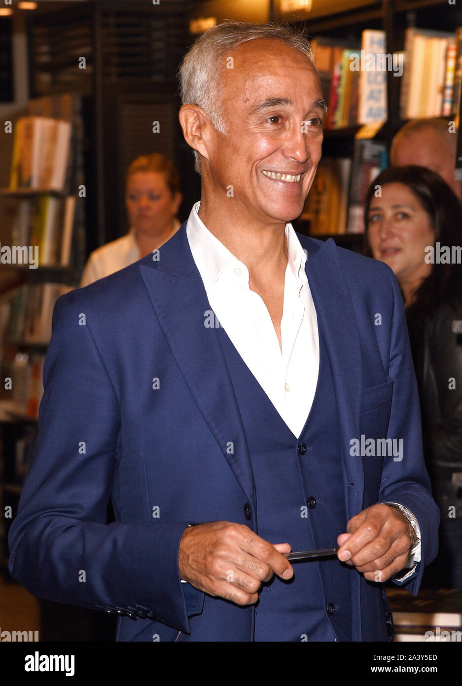 London, UK. Andrew Ridgeley signs copies of his new book 'Wham! George ...