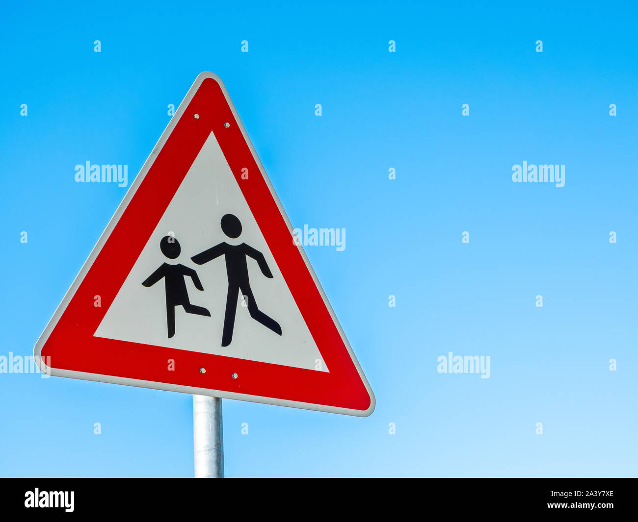 Attention children traffic sign Stock Photo - Alamy