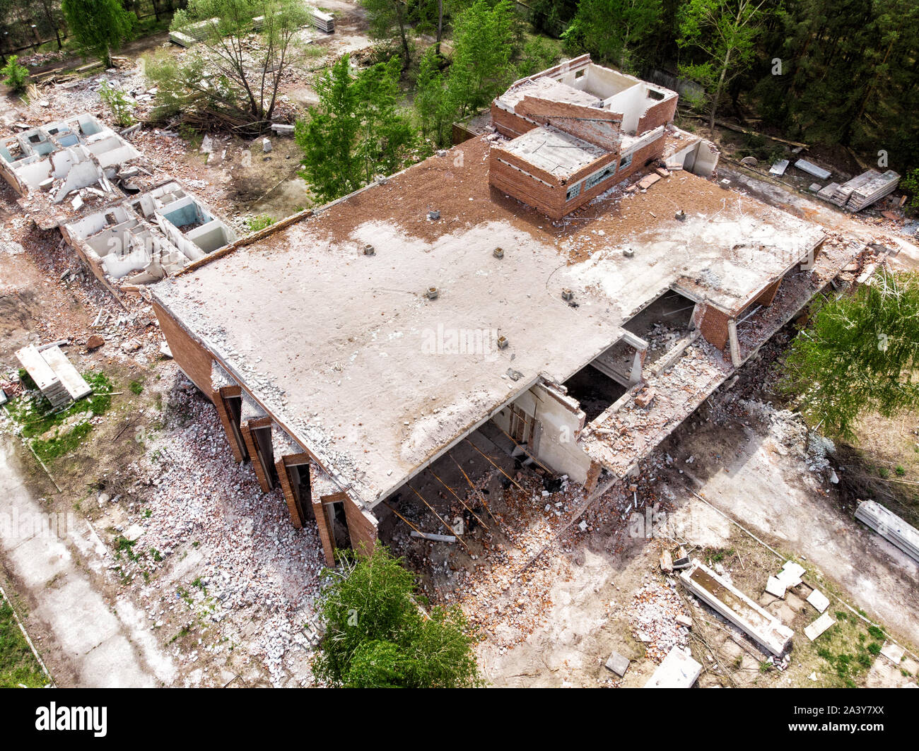 Aerial drone view of old demolished industrial building. Pile of ...