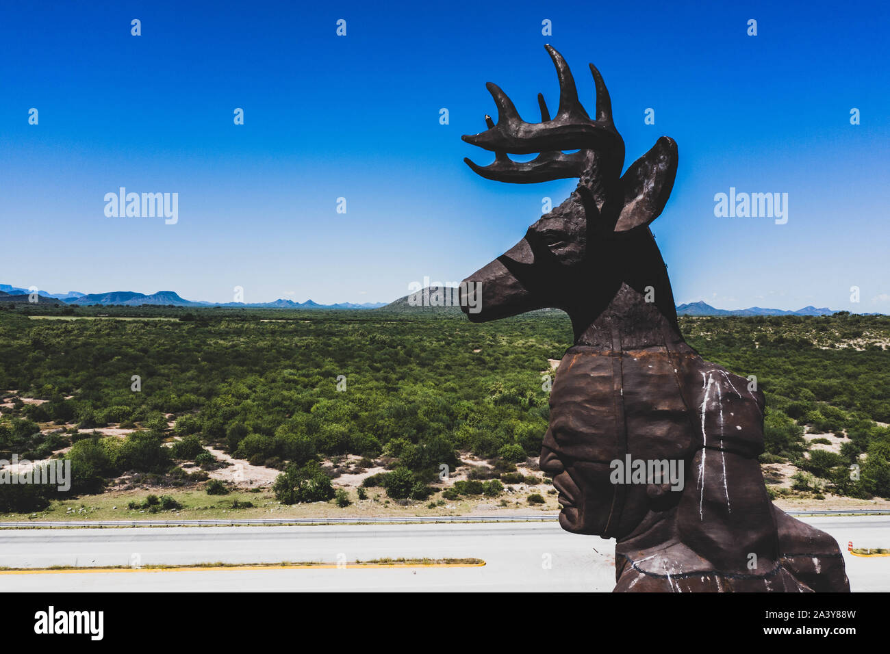Giant dancing statue Yaqui or dance of the deer of the indigena ethnic ...