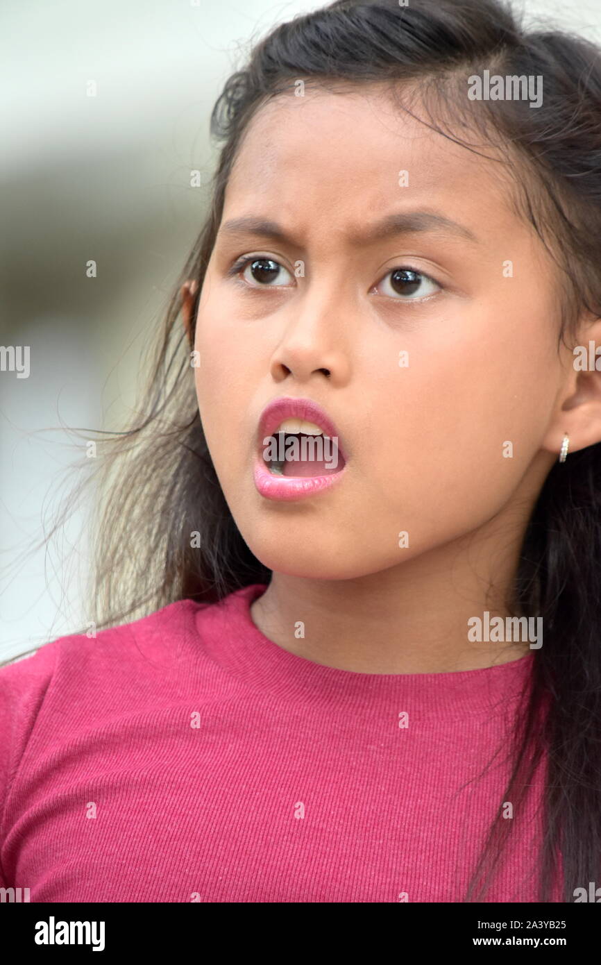 Confused Youthful Female Tween Stock Photo - Alamy
