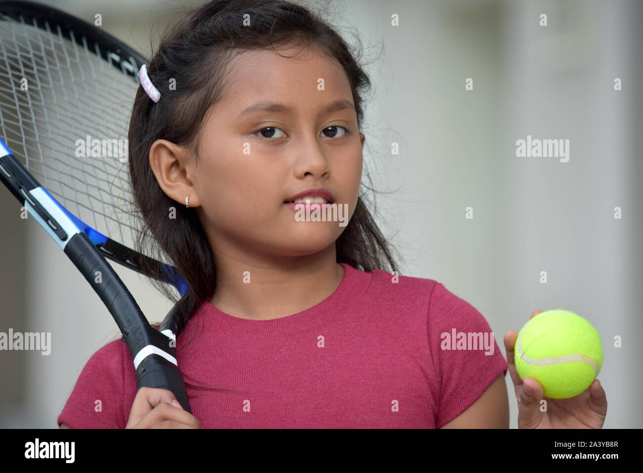 Pretty Athletic Filipina Female Tennis Player With Tennis Racket Stock ...