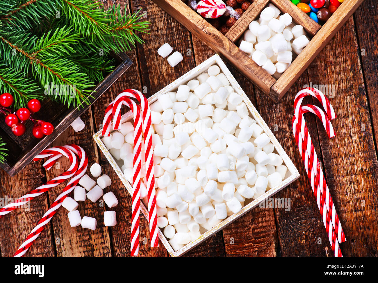 christmas candy in box and on a table Stock Photo - Alamy