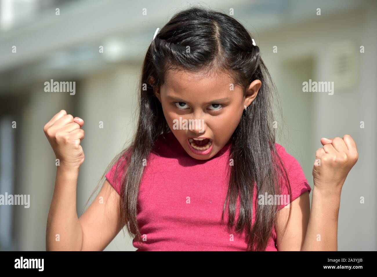 Young Asian Girl And Anger Stock Photo - Alamy