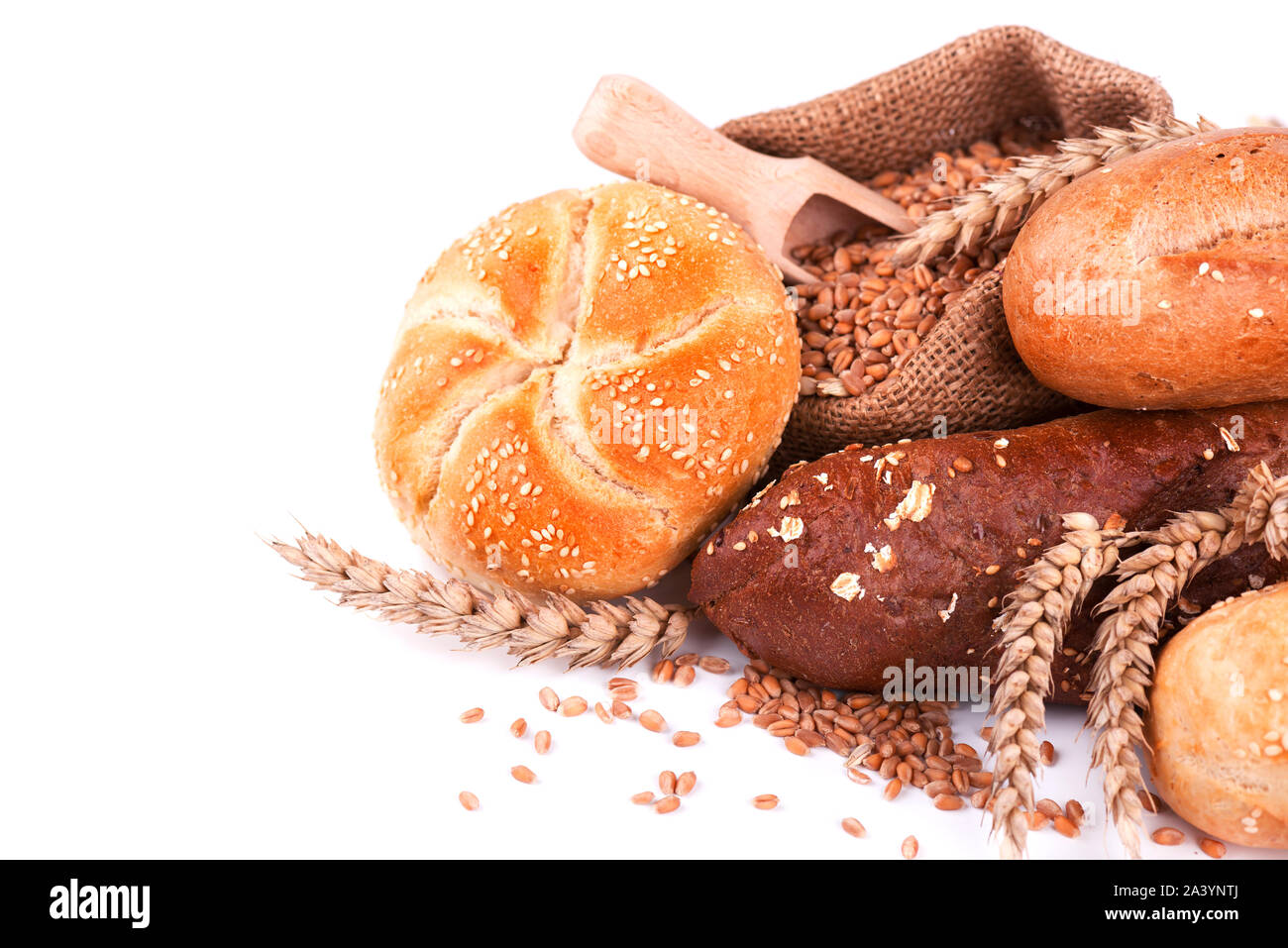 Bread and buns on napkin isolated on white background. Assorted breads ...