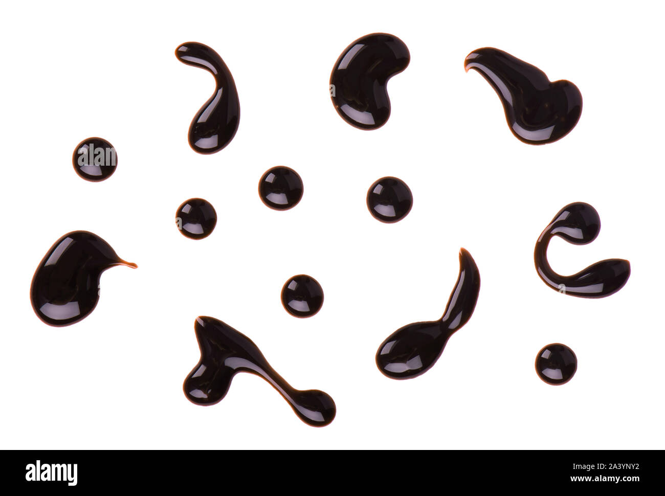 Chocolate syrup drop isolated on white background. Top view Stock Photo ...