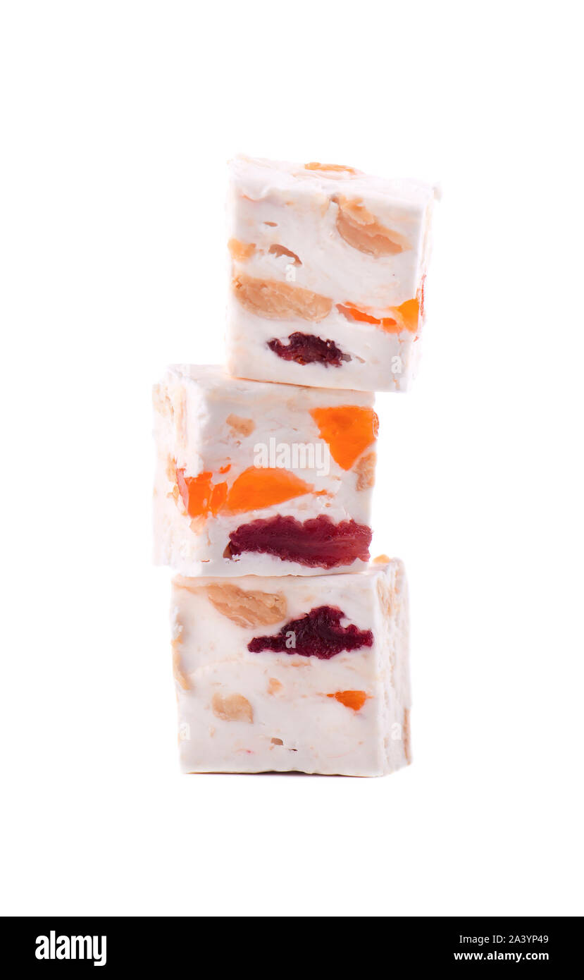Nut nougat with dried fruit, sweet candy isolated on white background ...