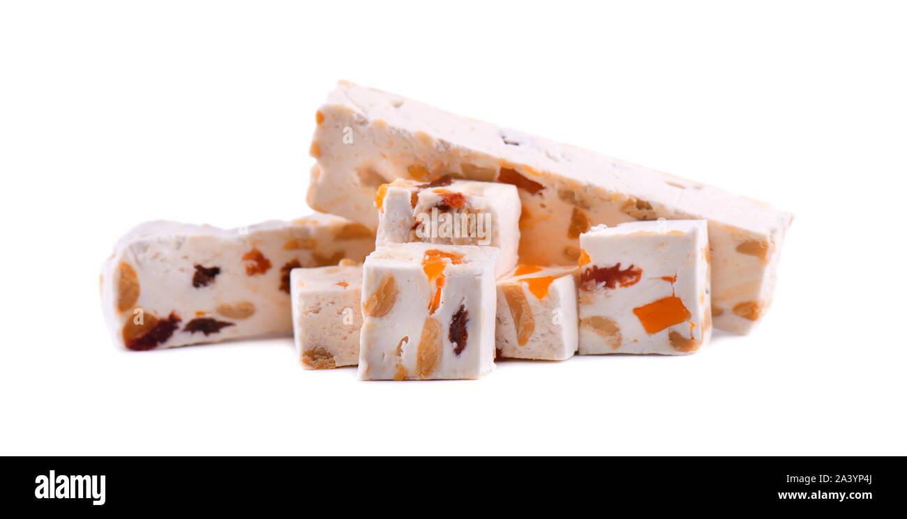 Nut nougat with dried fruit, sweet candy isolated on white background ...