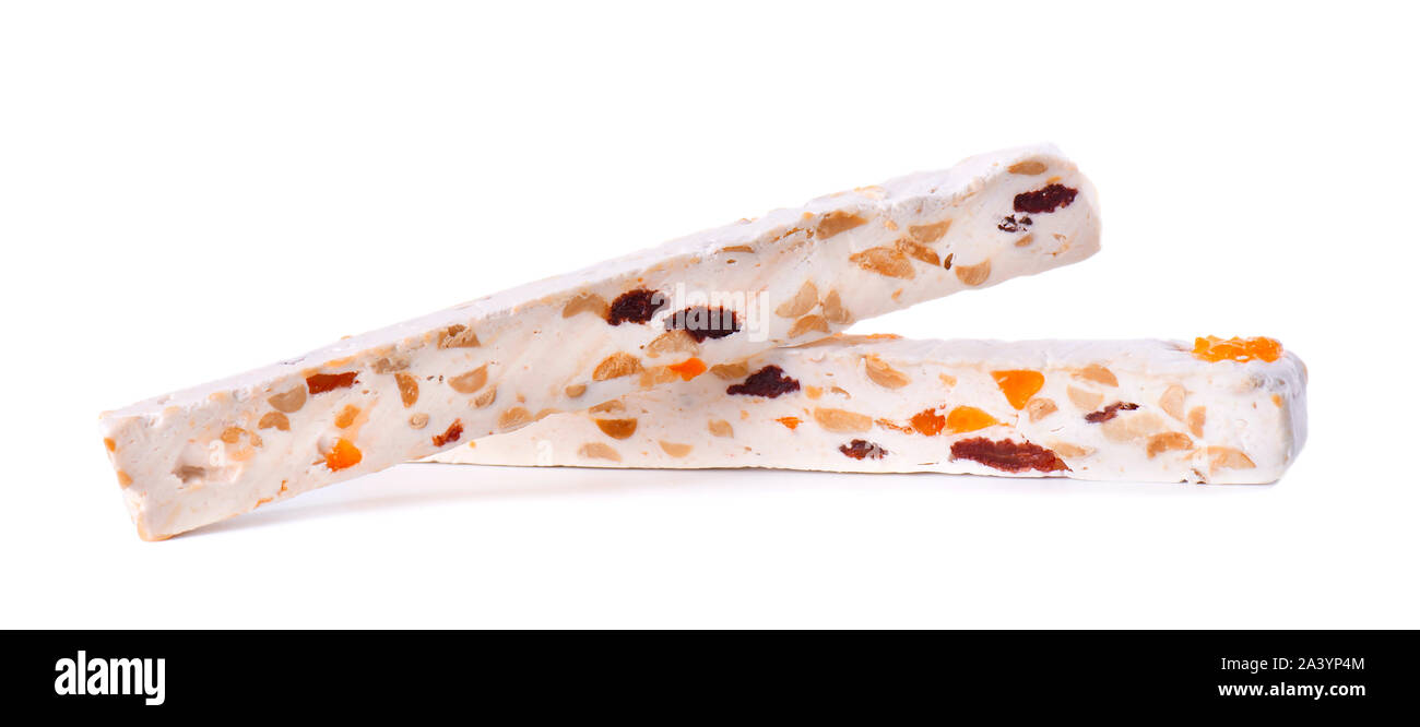 Nut nougat with dried fruit, sweet candy isolated on white background ...