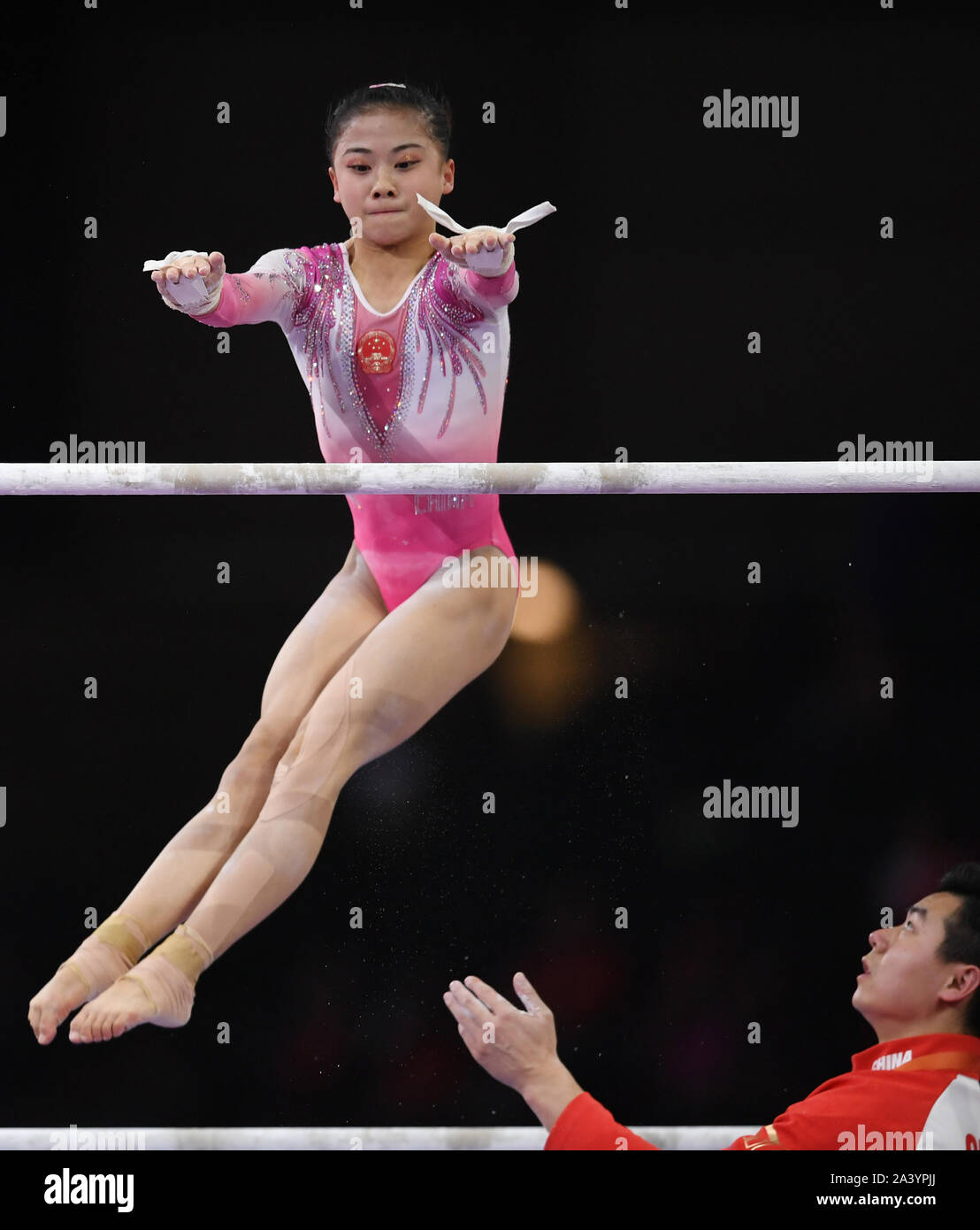Stuttgart, Germany. 10th Oct, 2019. Chinese gymnast Li Shijia (top ...