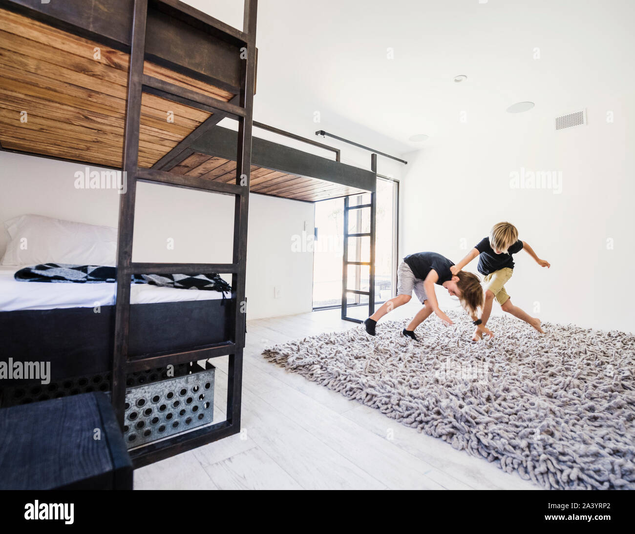 Play fighting bedroom hi-res stock photography and images - Alamy