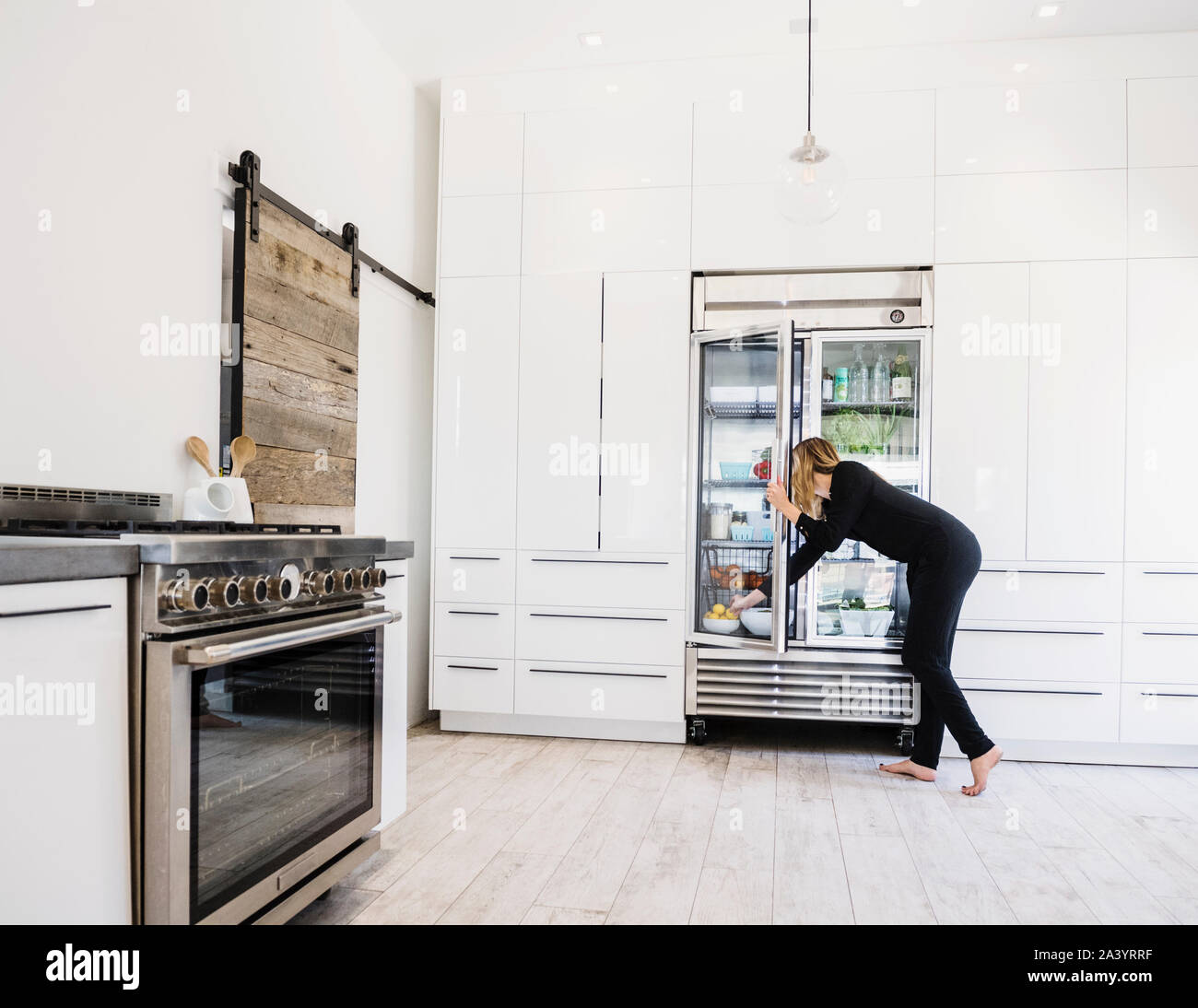 Reaching Into Refrigerator High Resolution Stock Photography and Images ...