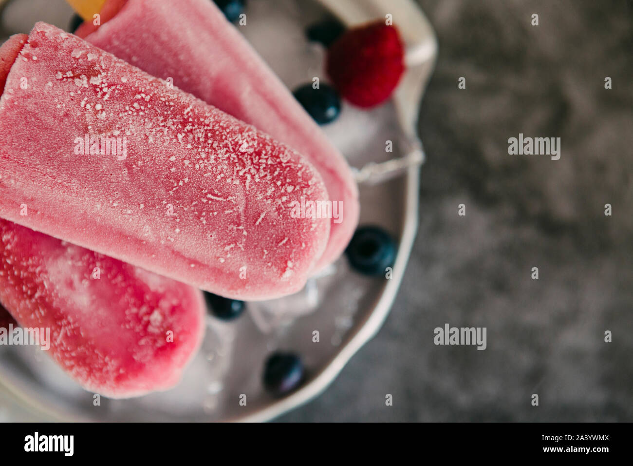 Berry ice pops with berries Stock Photo - Alamy